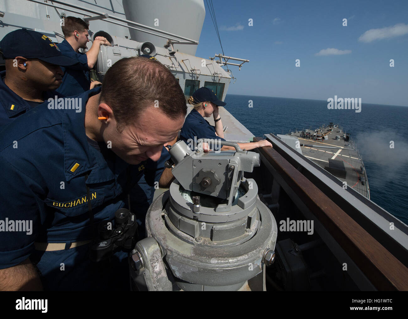 GULF OF OMAN (Dec. 10, 2013) Junior officers aboard the guided-missile ...