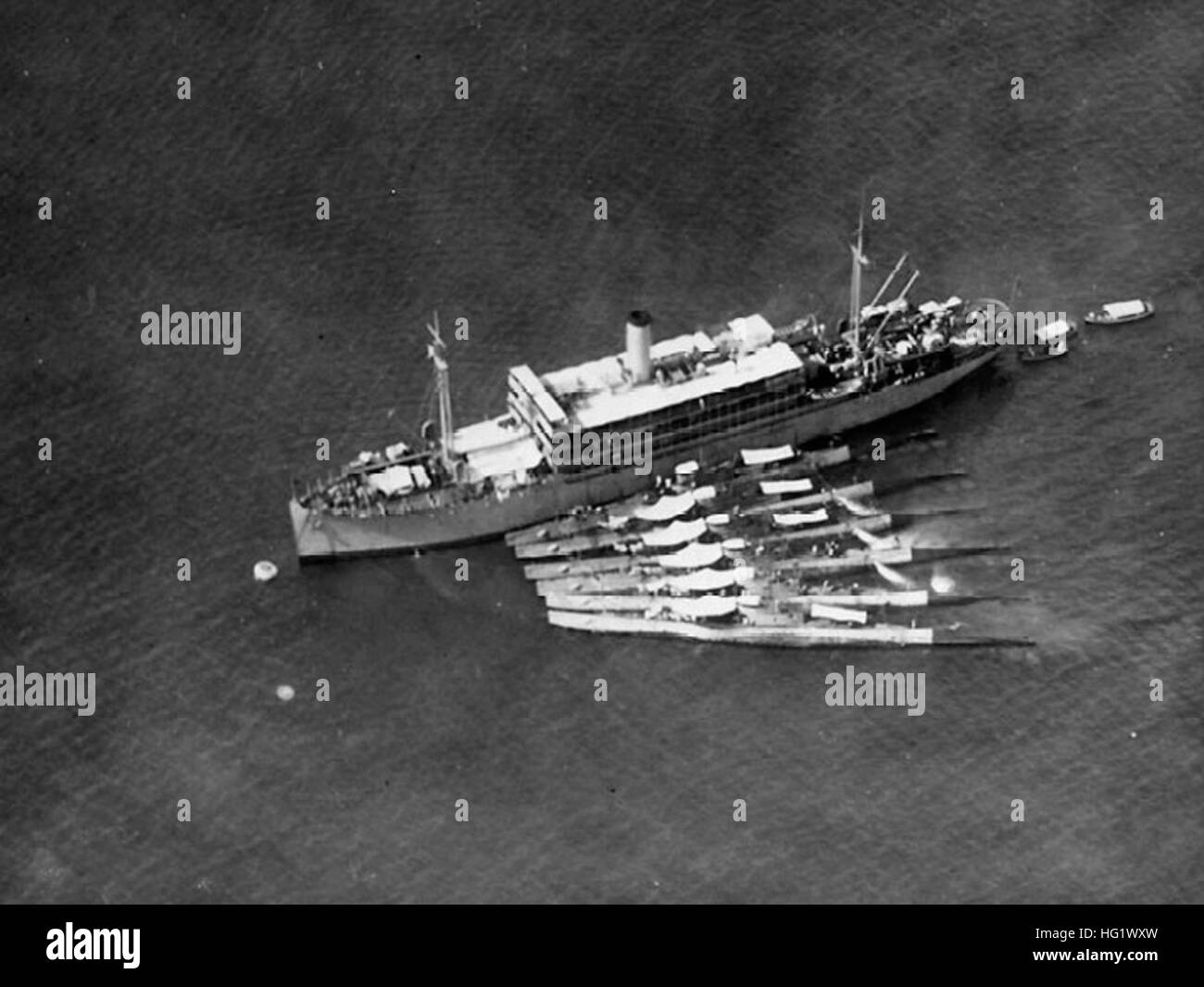 USS Canopus (AS-9) with submarines at Guam in 1924 Stock Photo - Alamy