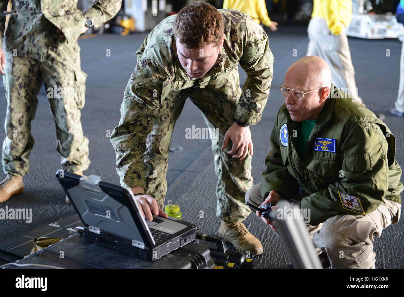 Explosive Ordnance Disposal Technician 2nd Class demonstrates the ...