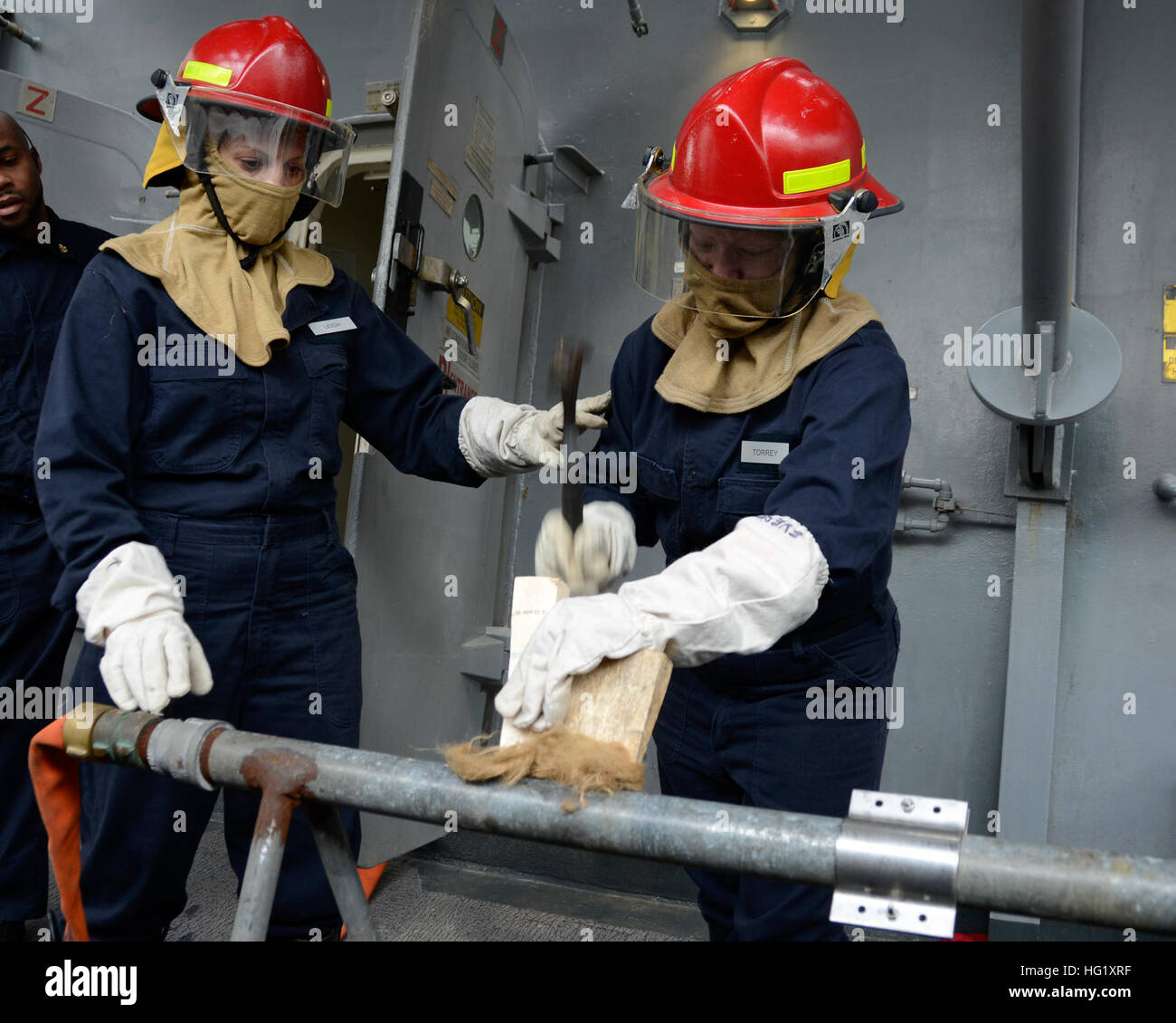Damage Controlman 2nd Class Vanessa Leigh, from Cathlamet, Wash., and ...