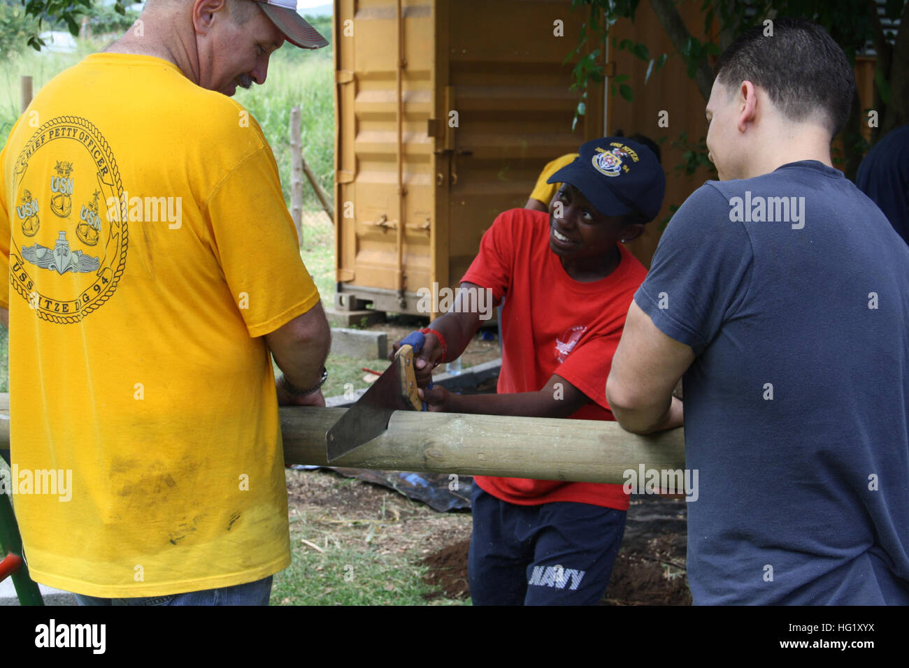From left, U.S. Navy Command Master Chief Michael Apperson, left, a ...
