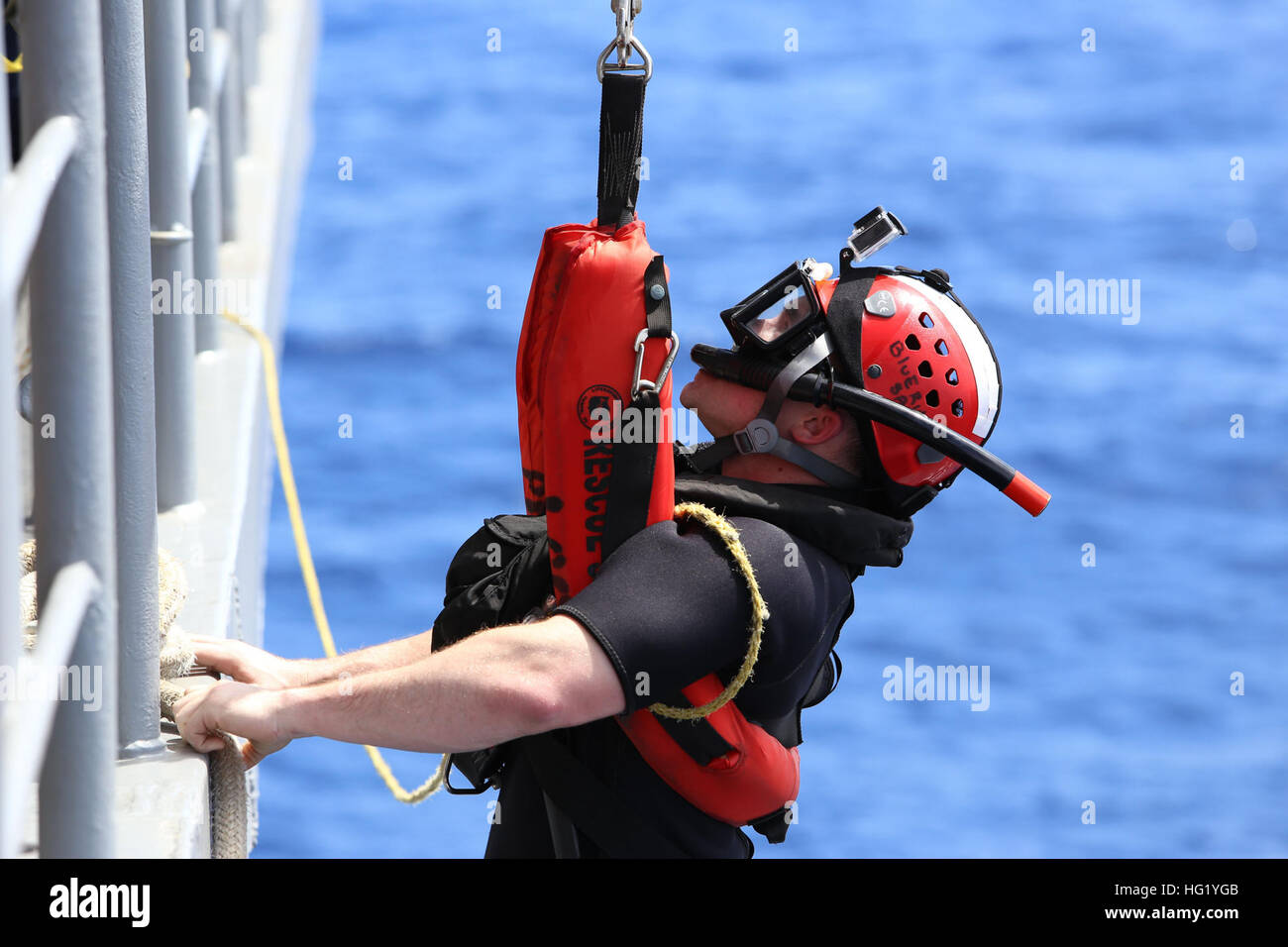 U.S. Navy Damage Controlman 3rd Class Kevin O'Connell, a rescue swimmer ...