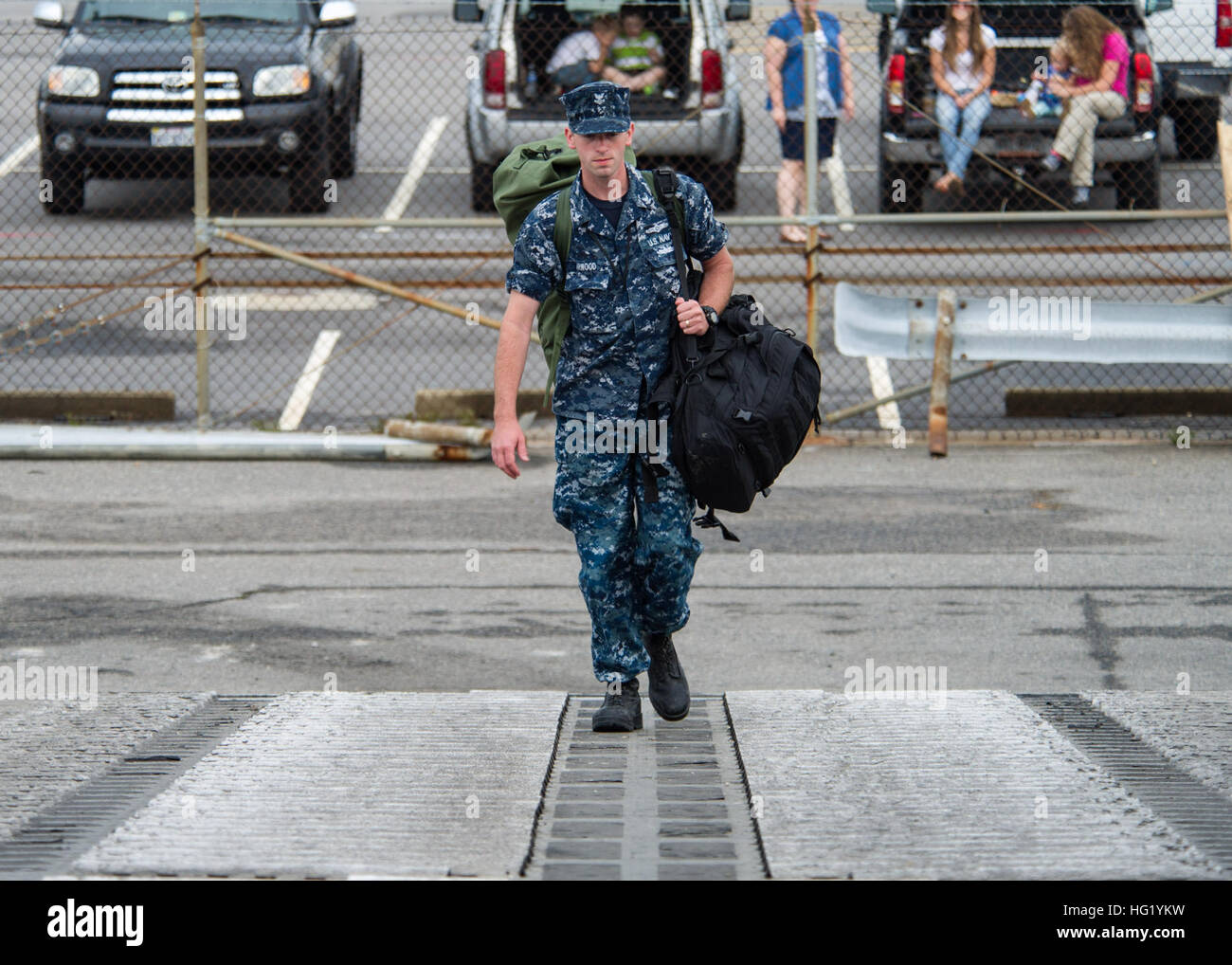 Cryptologic Technician Maintenance 2nd Class Philip Arwood walks up the ...