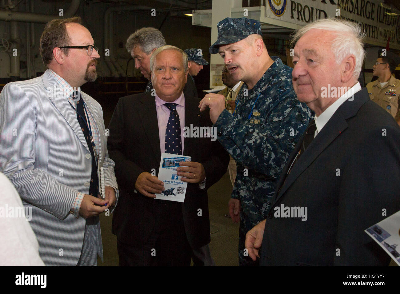 Capt. David Bossert, commanding officer USS Kearsarge (LHD 3), gives a ...