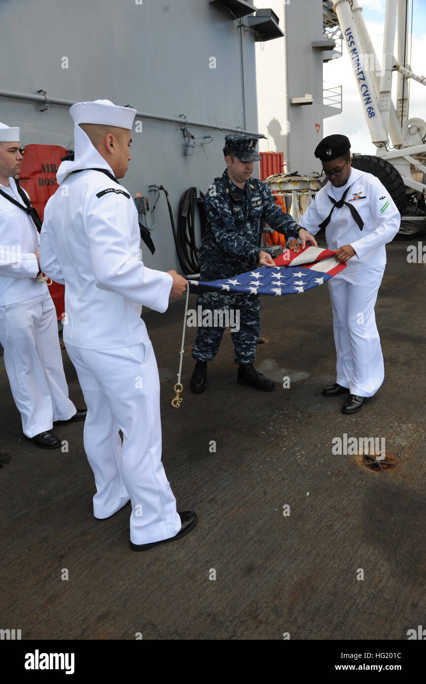 U.S. Navy Ship's Serviceman Seaman Van T. Le, left, Senior Chief ...