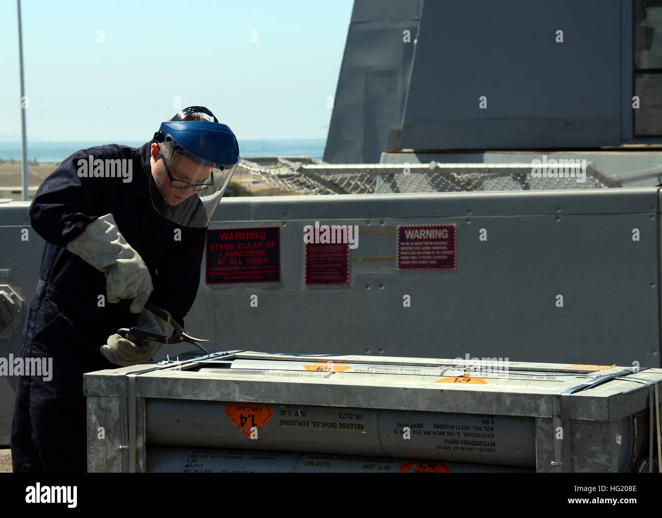 Cryptologic Technician (Technical) 2nd Class Stefan Dircks removes ...