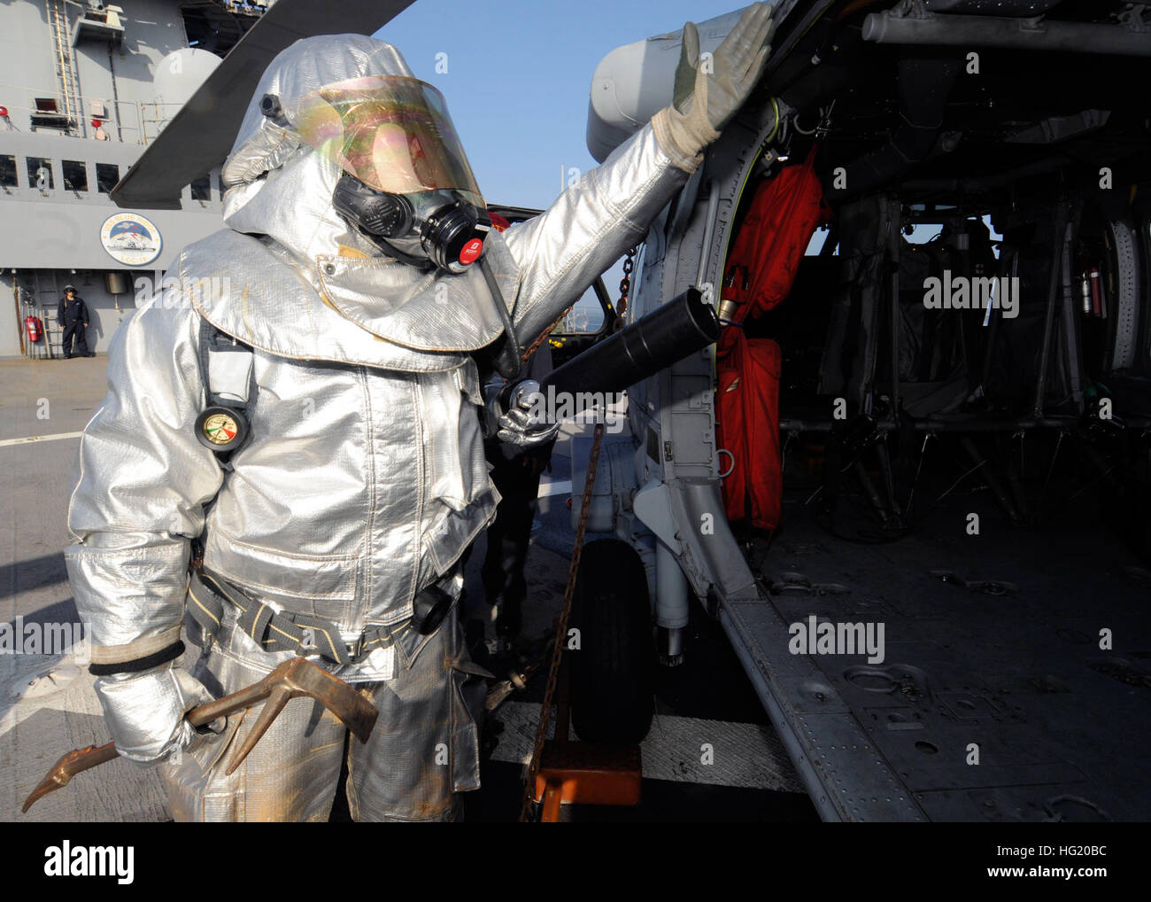 U.S. Navy Hull Maintenance Technician 3rd Class William Lomax checks ...