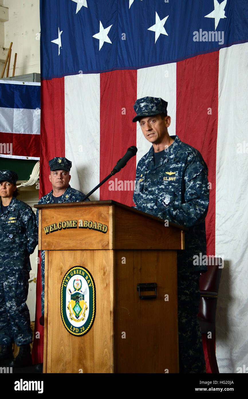 Commanding Officer, Capt. Gregory Huffman speaks to the crew during a ...