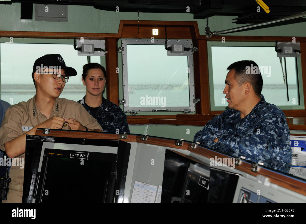 Yeoman 1st Class John Sahuaraura, right, asks questions during a tour ...