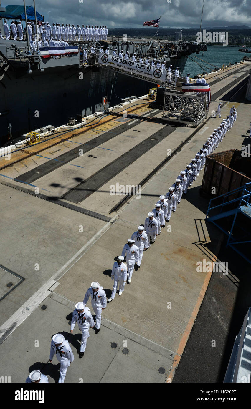 The crew of the amphibious transport dock ship USS Denver (LPD 9 ...