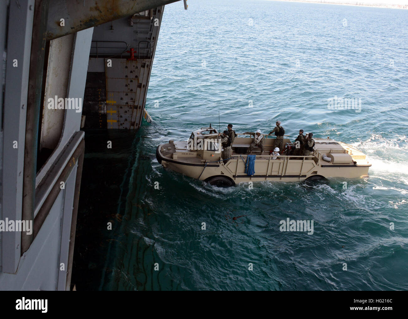 A light amphibious resupply cargo (LARC) vehicle approaches the well ...
