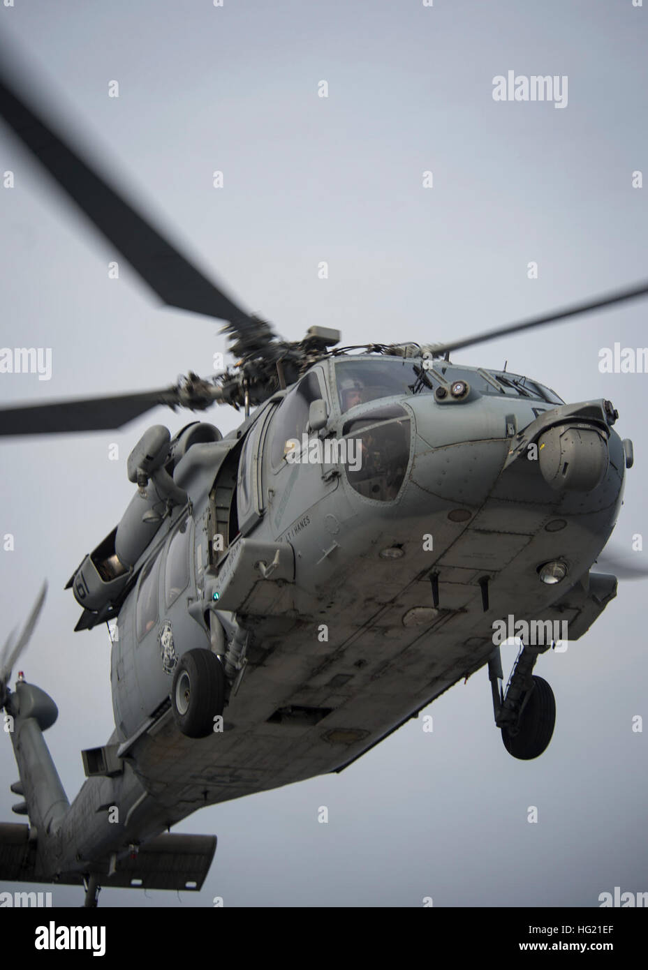 An MH-60S Sea Hawk helicopter, assigned to Helicopter Sea Combat ...