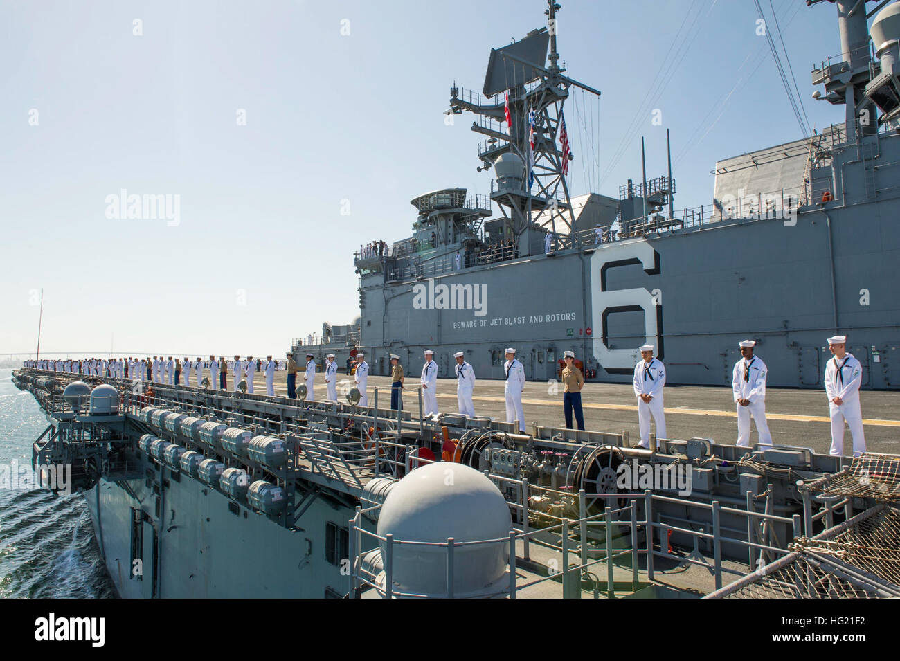 Sailors and Marines assigned to future amphibious assault ship USS ...