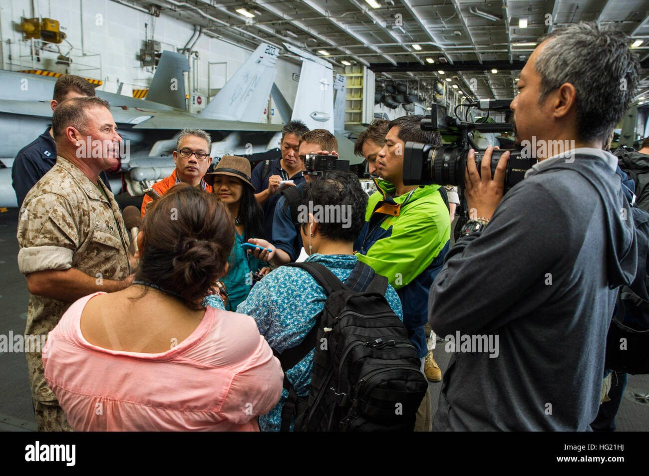 U.S. Marine Corps Col. Christopher Papaj, left, the assistant commander ...