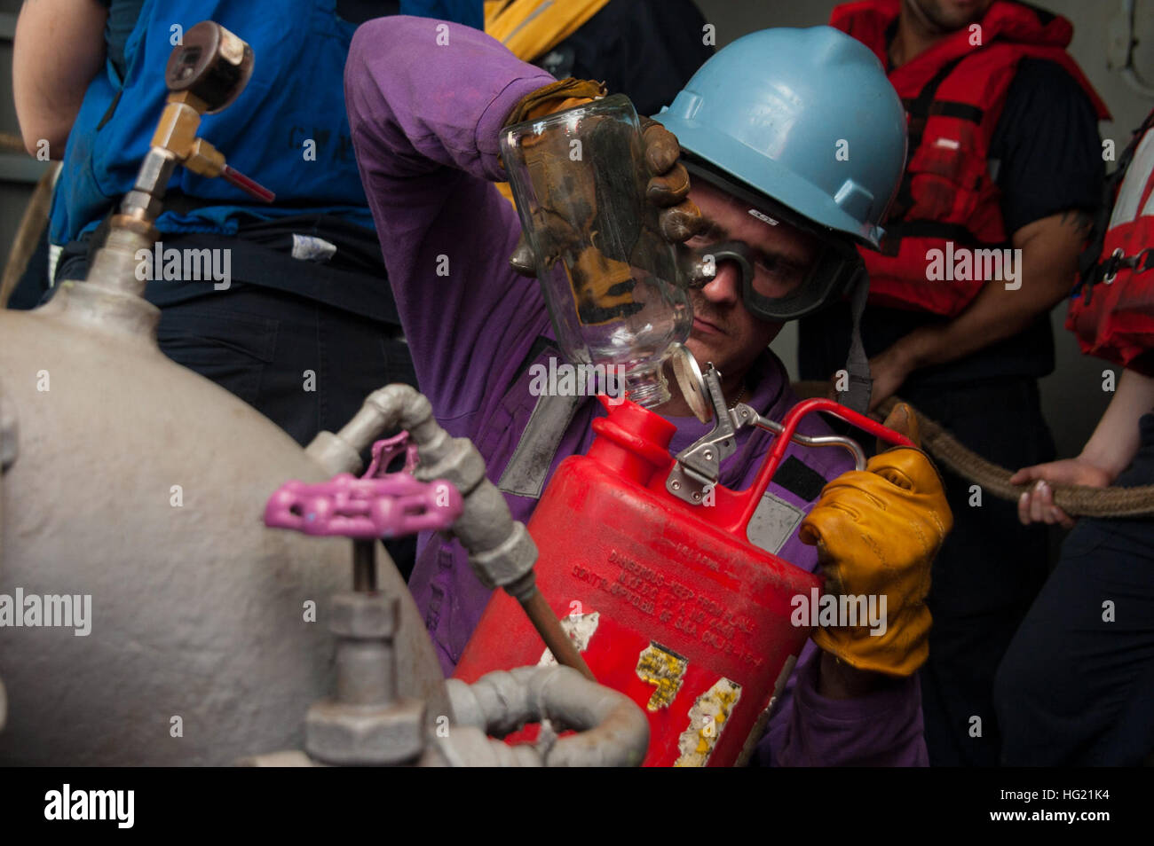 Aviation Boatswain's Mate (Fueling) Airman Travis Roach takes a fuel ...