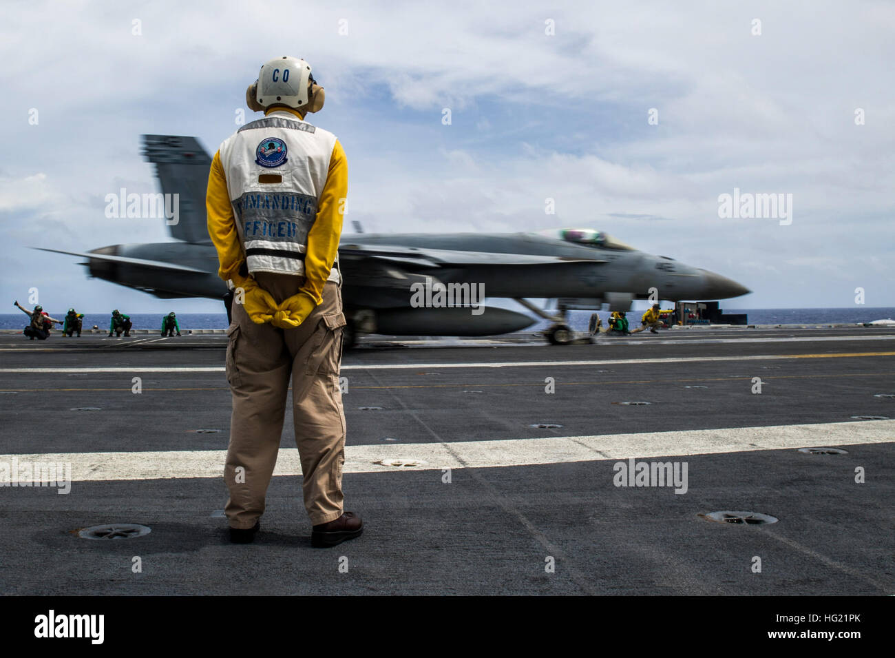 Capt. Gregory Fenton, commanding officer of the Nimitz-class aircraft carrier USS George ...