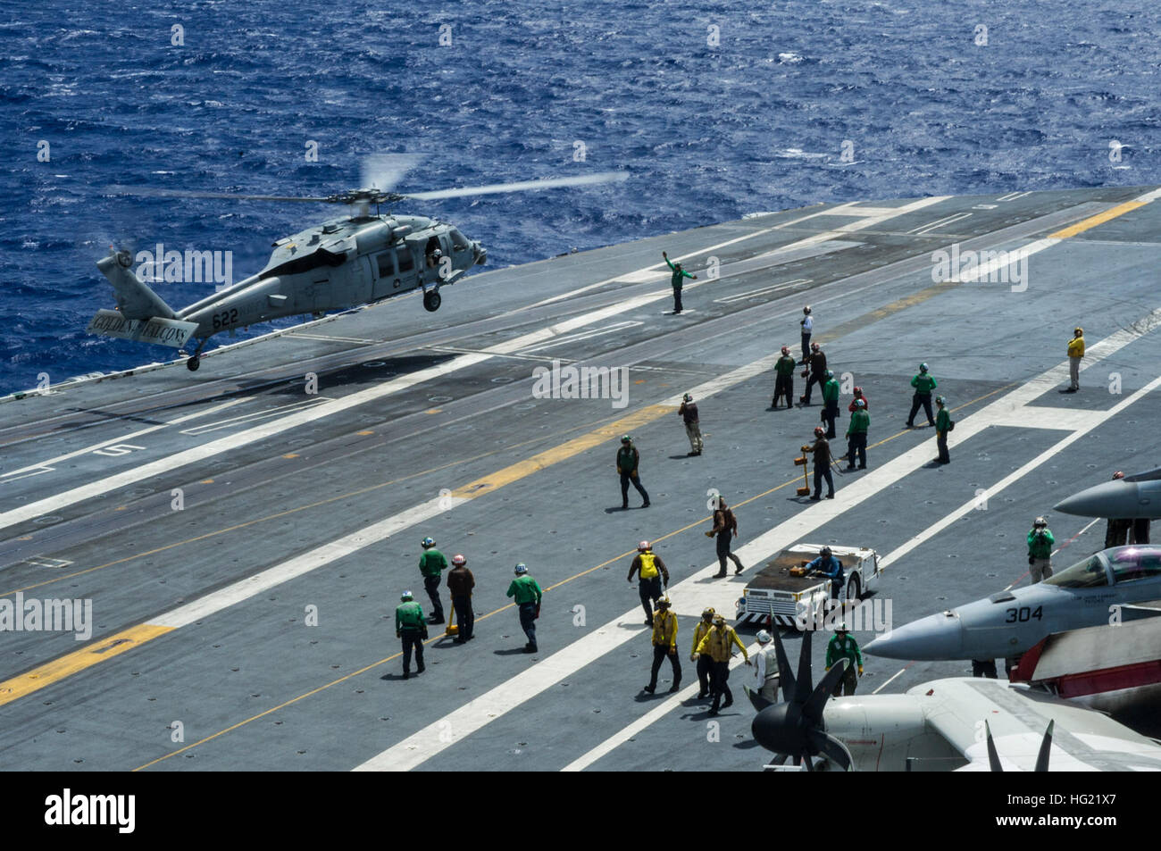 An MH-60S Sea Hawk helicopter from the Golden Falcons of Helicopter Sea ...