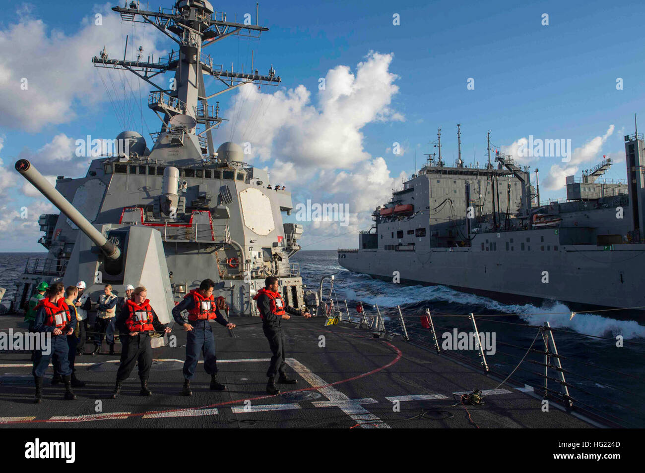 Sailors man a line aboard the Arleigh Burke-class guided-missile ...