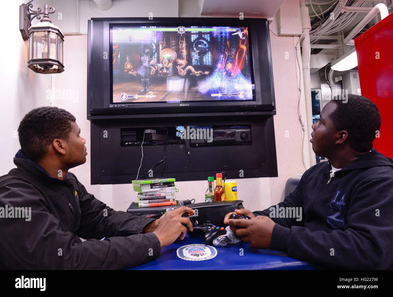 Sailors aboard the Arleigh Burke-class guided-missile destroyer USS ...