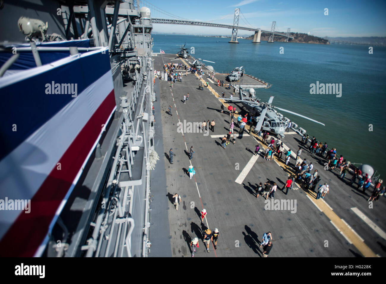 Visitors tour the flight deck of amphibious assault ship USS America ...