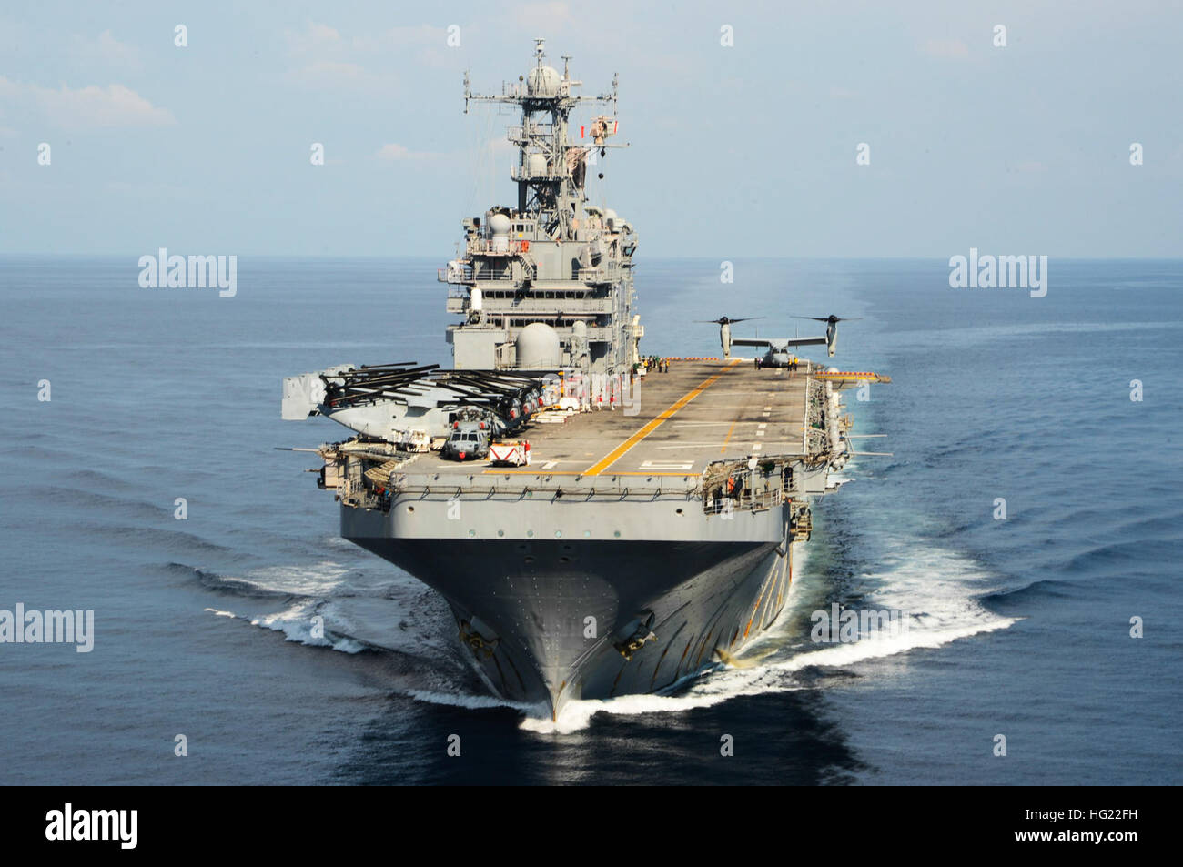 The amphibious assault ship USS Peleliu (LHA 5) sails into open water as part of the Peleliu ...
