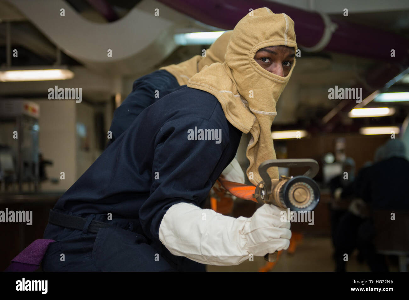 Fireman Apprentice Dequan Fort demonstrates how to properly relieve a ...