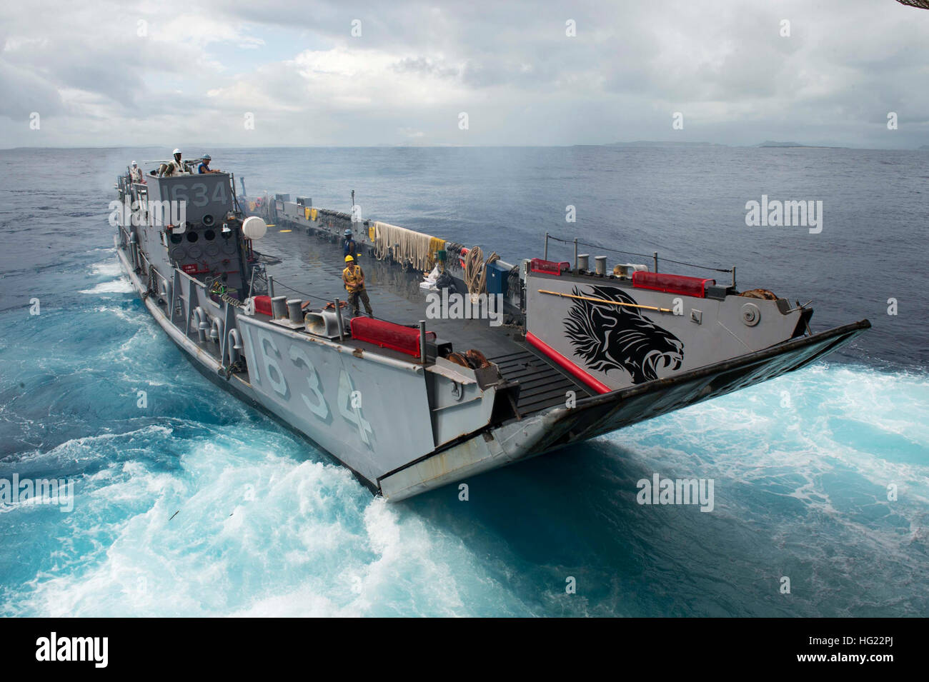 Landing Craft Utility (LCU) 1634, assigned to Naval Beach Unit (NBU) 7, departs the well deck of ...