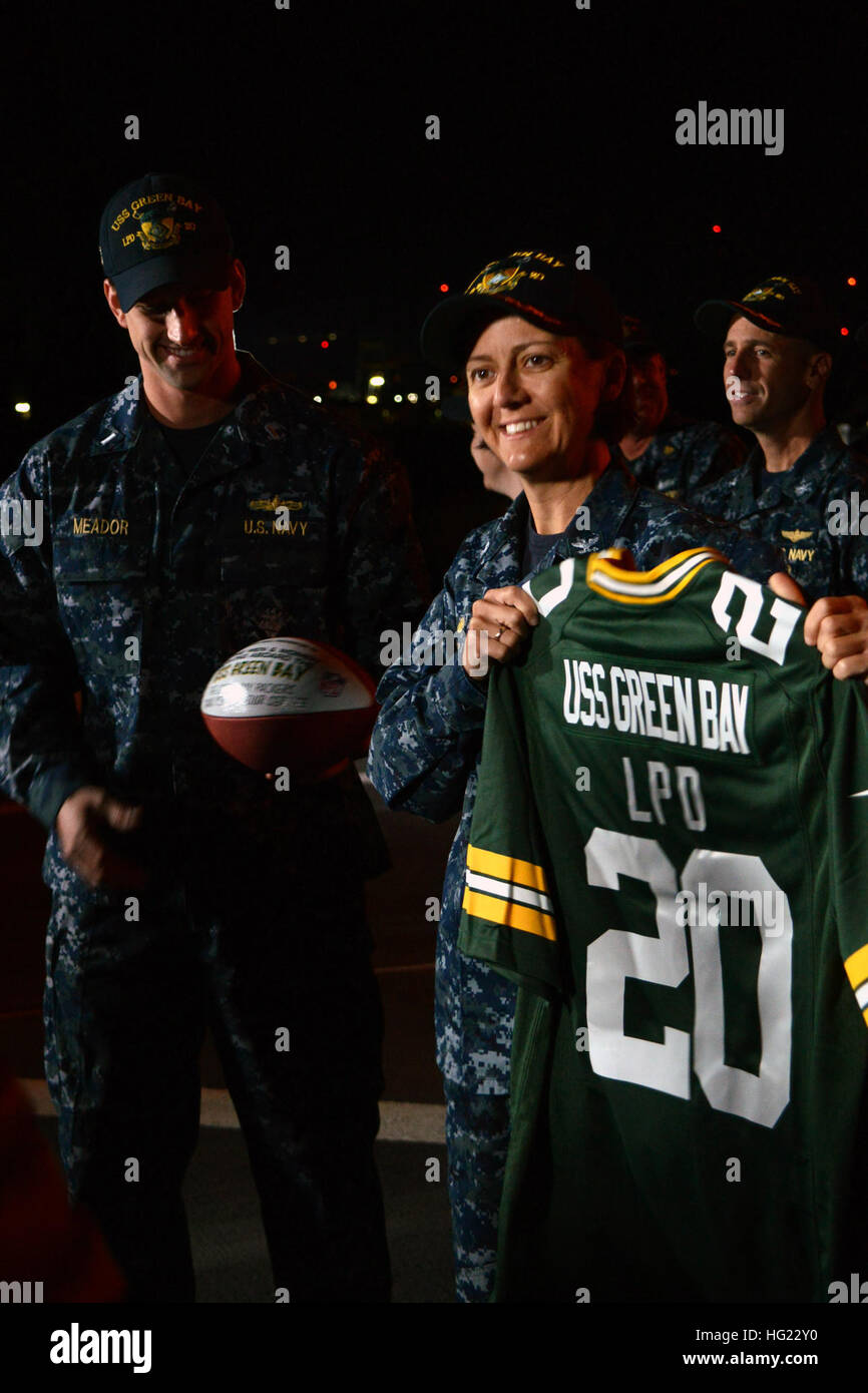Commanding Officer, Capt. Kristy McCallum receives USS Green Bay jersey ...