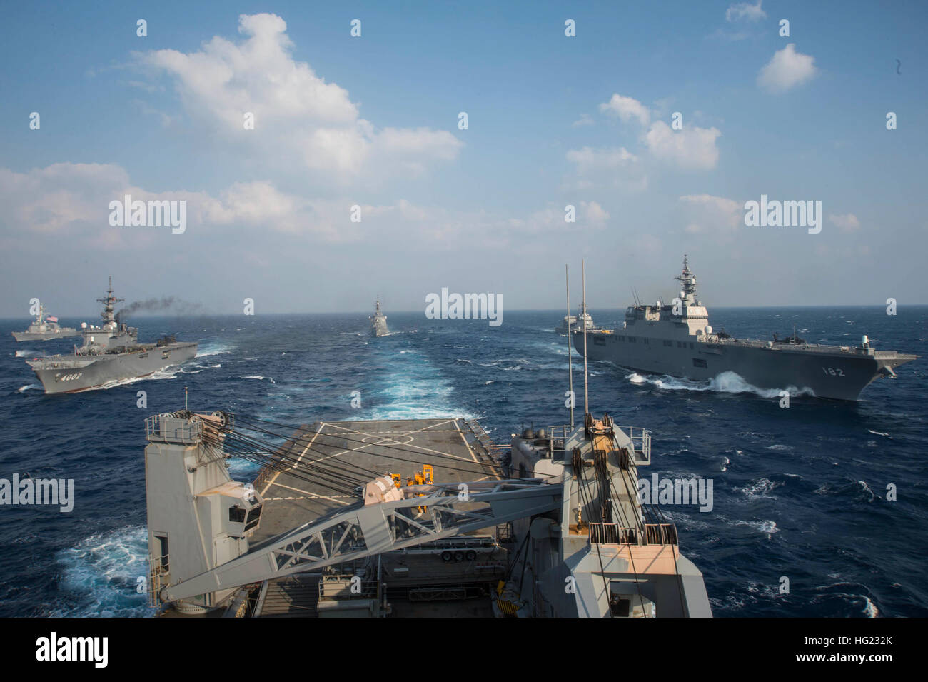 (From left to right) The guided-missile destroyer USS Halsey (DDG 97 ...