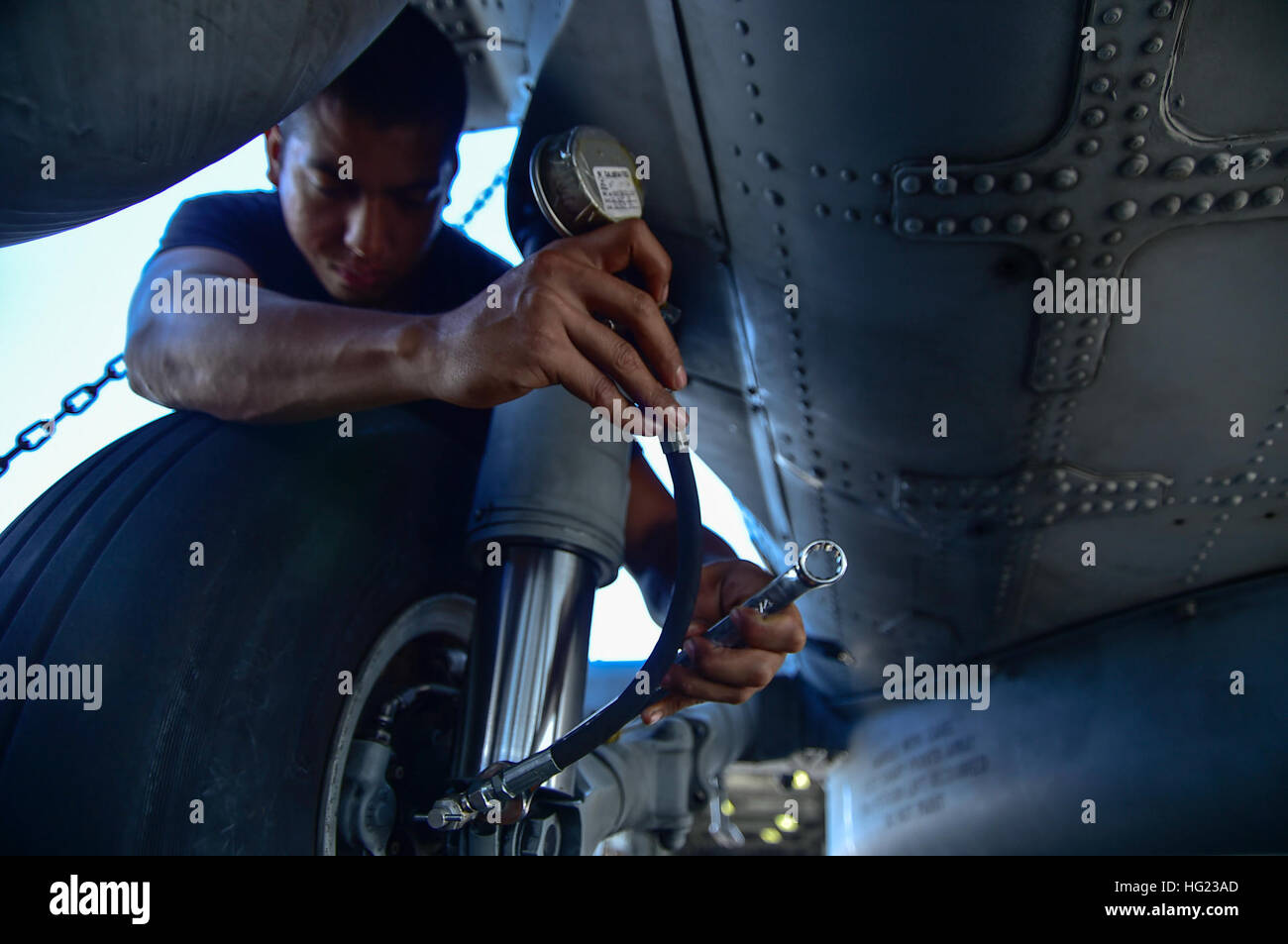 Aviation Structural Mechanic 2nd Class Miguel Medina performs ...