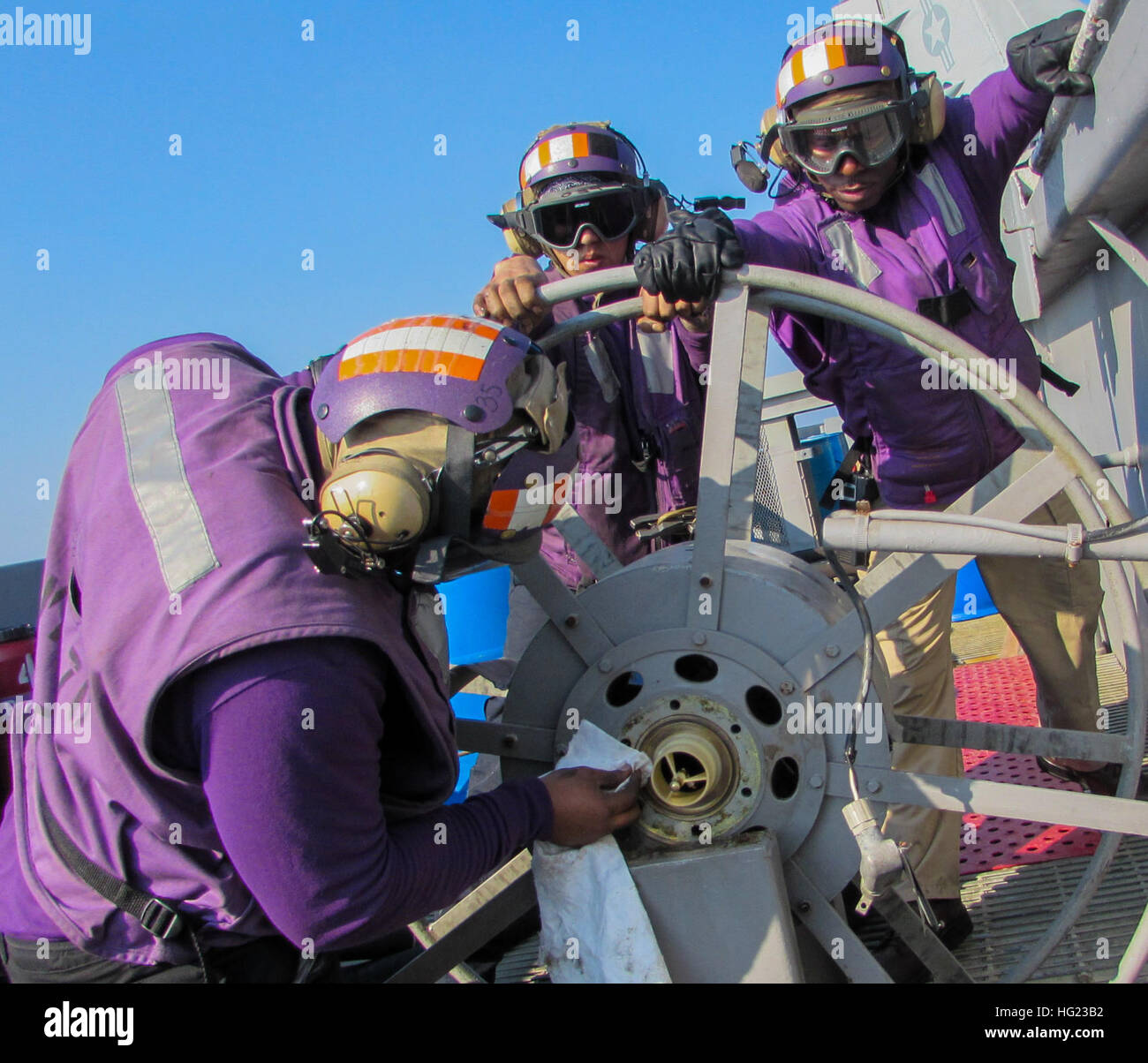 Chief Aviation Boatswain’s Mate (Fuel) Derrick Moore, right, and ...