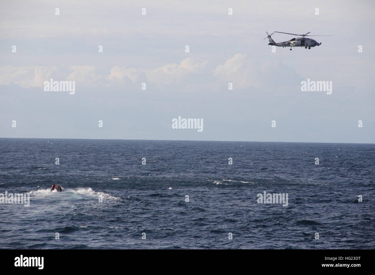 USS Gary's Rigid Hull Inflatable Boat with a joint U.S. Coast Guard ...