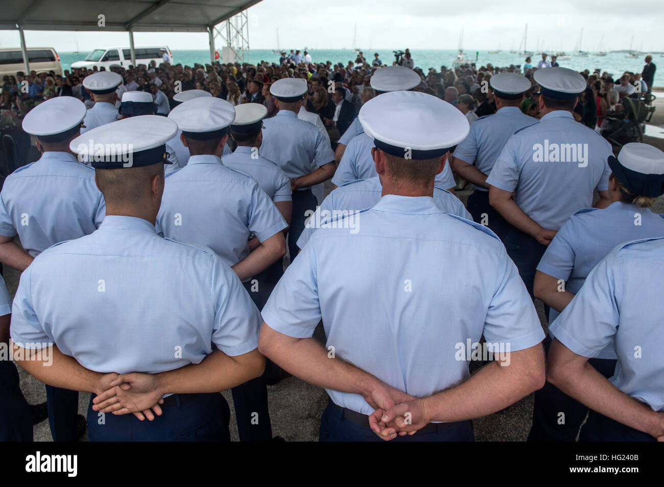 U.S. Coast Guard plank owners stand at parade rest during during the ...