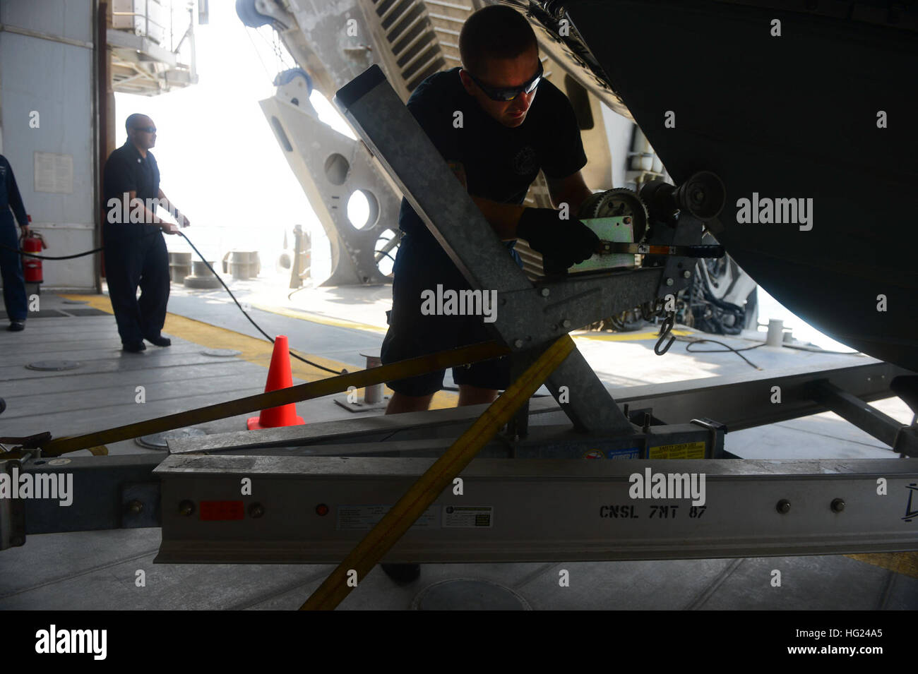 U.S. Navy Sailors, Coast Guard personnel, and civil service mariners ...