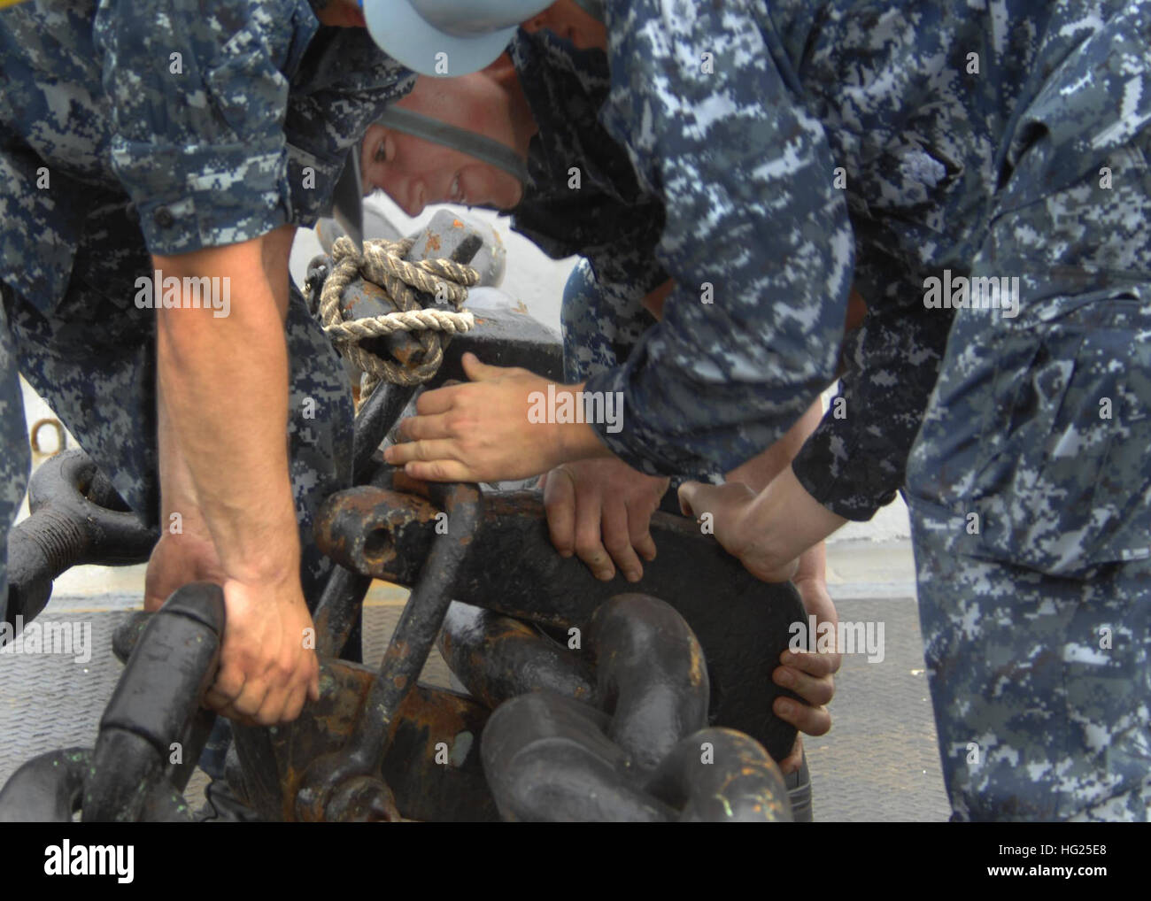 Sailors aboard amphibious transport dock ship USS Cleveland set the ...