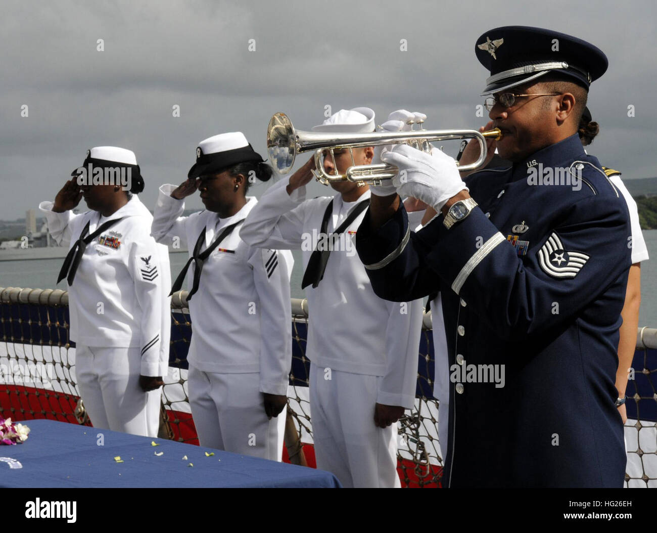 A U.S. Air Force bugler plays Taps during a remembrance ceremony for ...