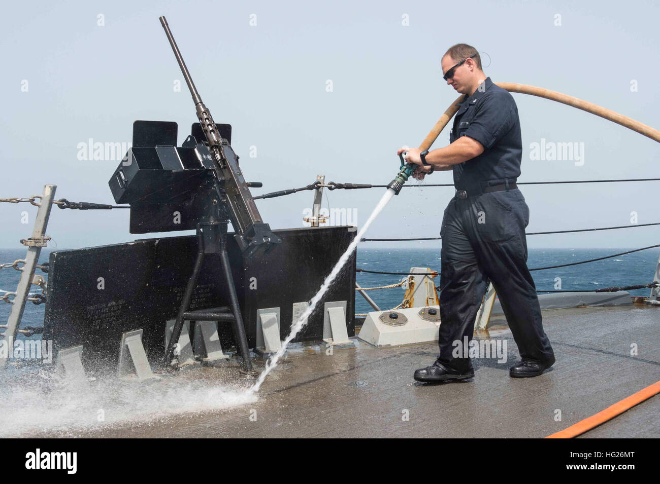 150425-N-VC236-020 ARABIAN GULF (April 25, 2015) - A Sailor assigned to ...
