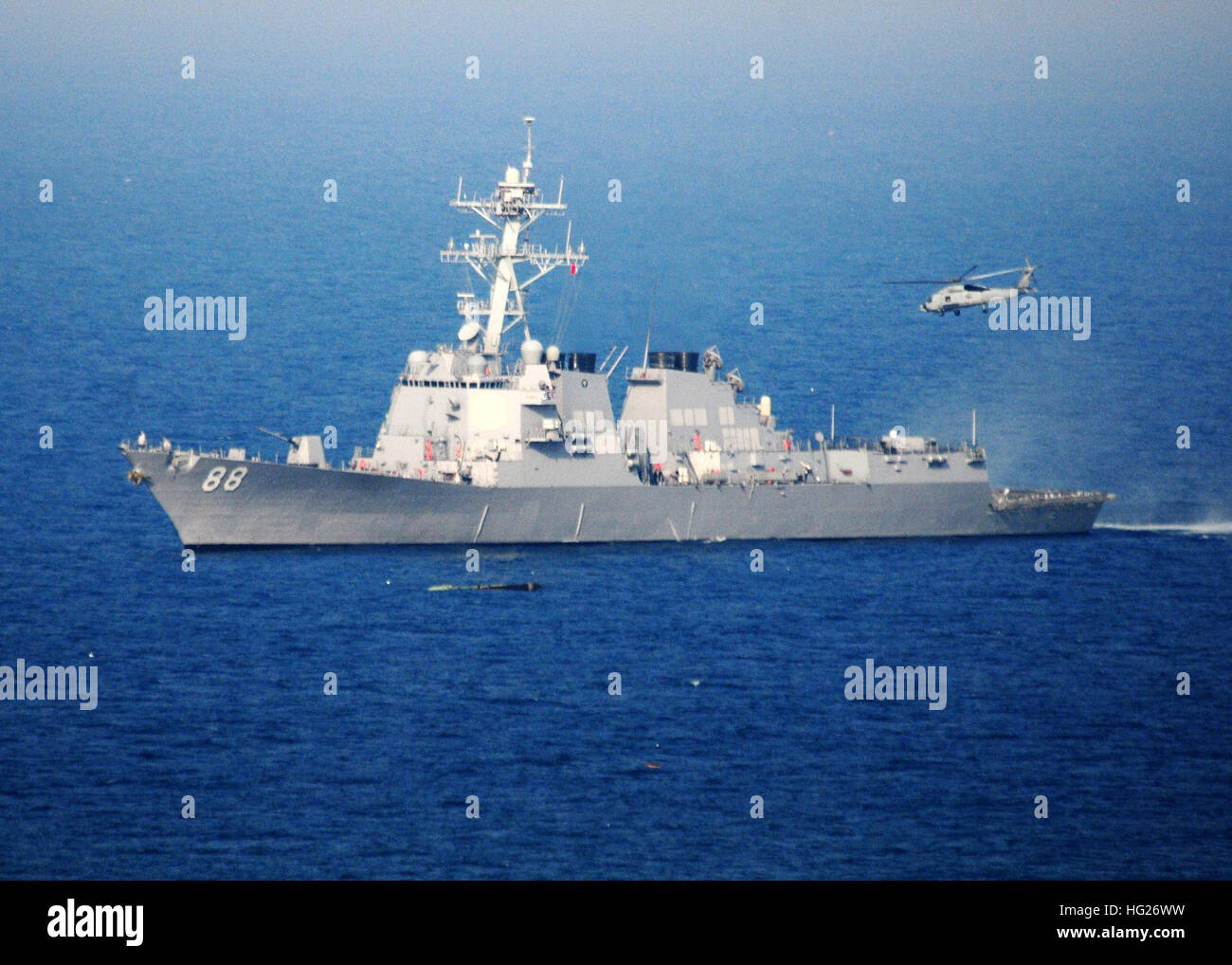 An HH-60H Sea Hawk helicopter lifts off from the guided-missile ...