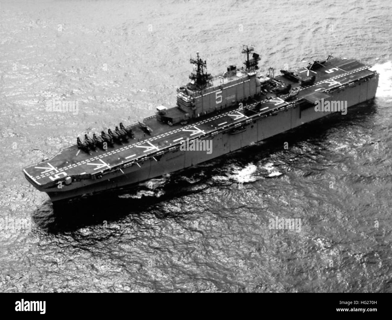 USS Peleliu (LHA-5) underway in the Pacific Ocean, off Peleliu Island, on 6 February 1984 ...