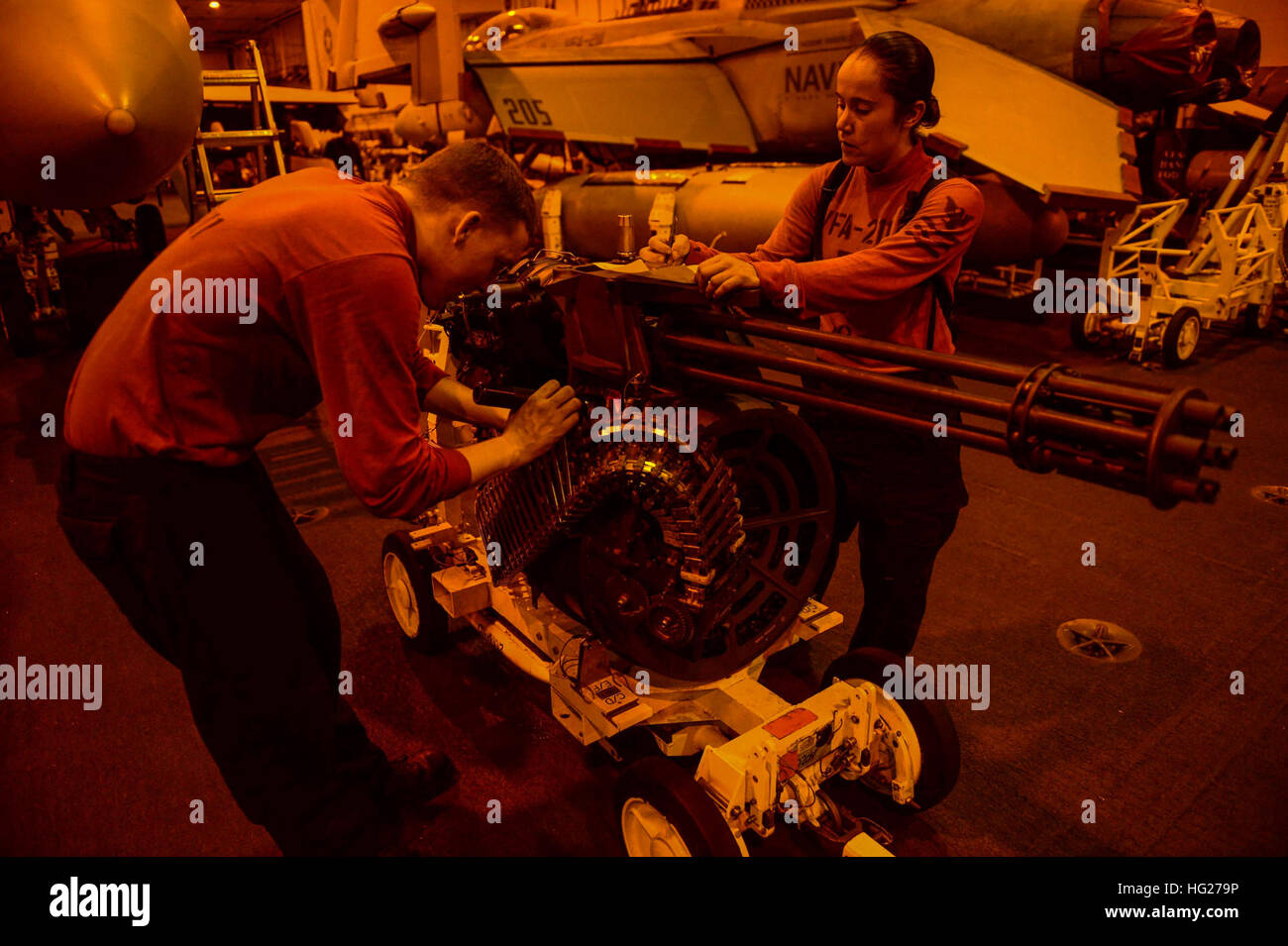 Aviation Ordnancemen aboard USS Theodore Roosevelt (CVN 71) inspect and ...