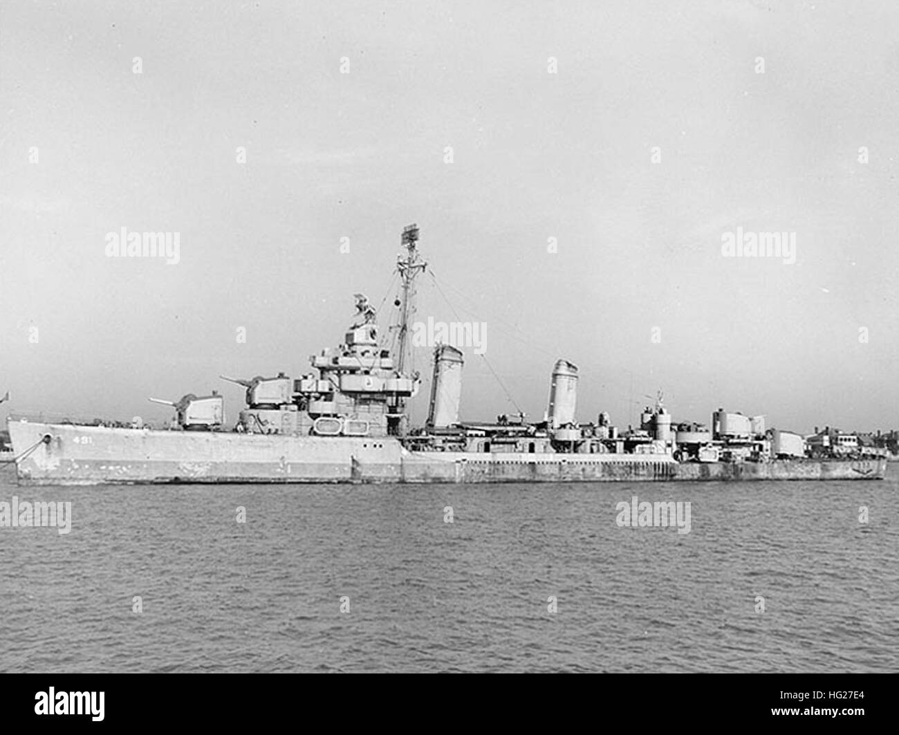 USS Farenholt (DD-491), a Gleaves-class destroyer, is shown at anchor ...
