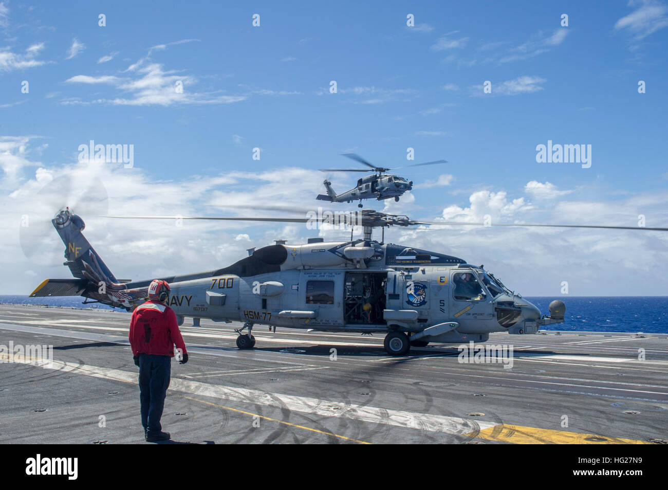 Two MH-60R Seahawk helicopters from Helicopter Maritime Strike Squadron ...