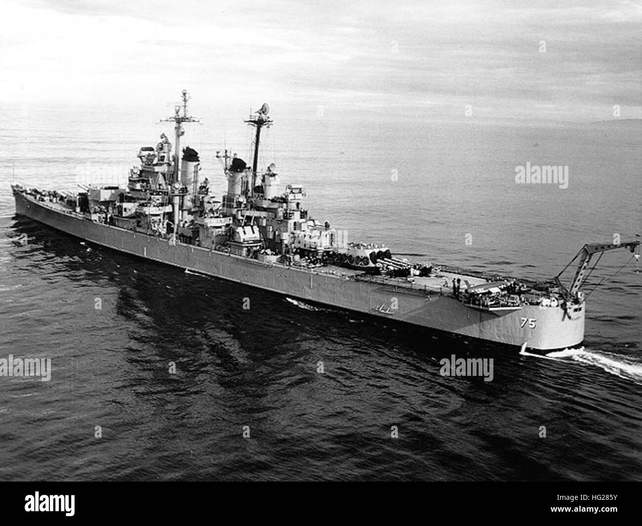 USS Helena (CA-75) with a Regulus I guided missile on her fantail being ...