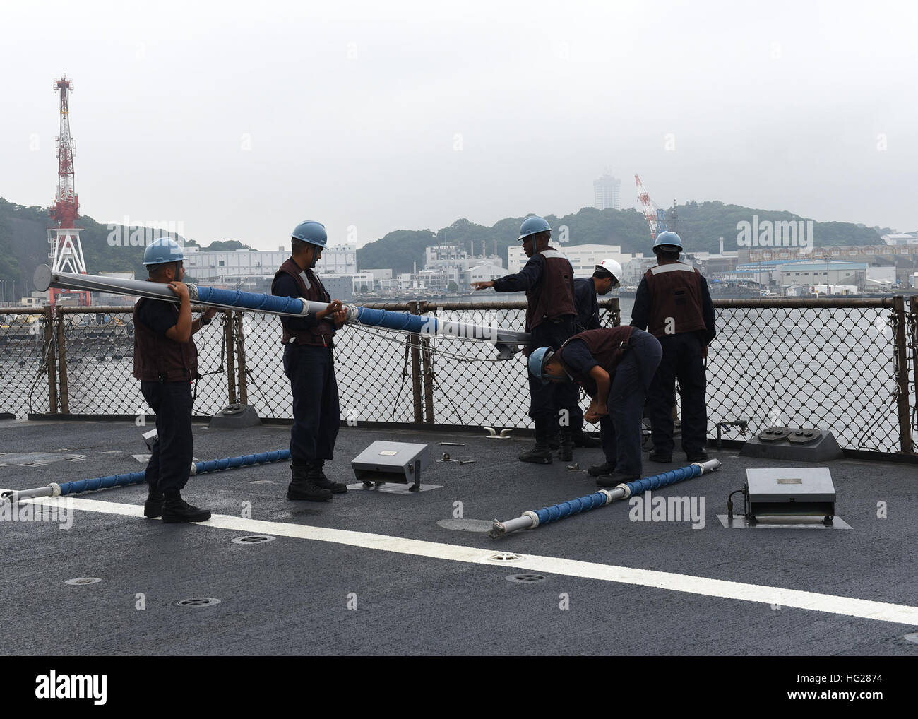 150617-N-NM917-022 YOKOSUKA, Japan (June 17, 2015) - Sailors attached ...