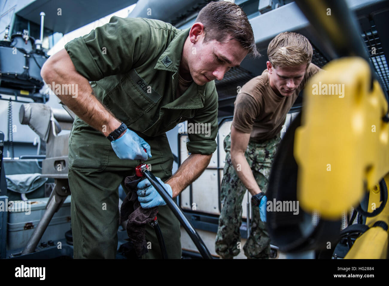INDIAN OCEAN (June 18, 2015) Engineman 3rd Class Matt Delia, left ...