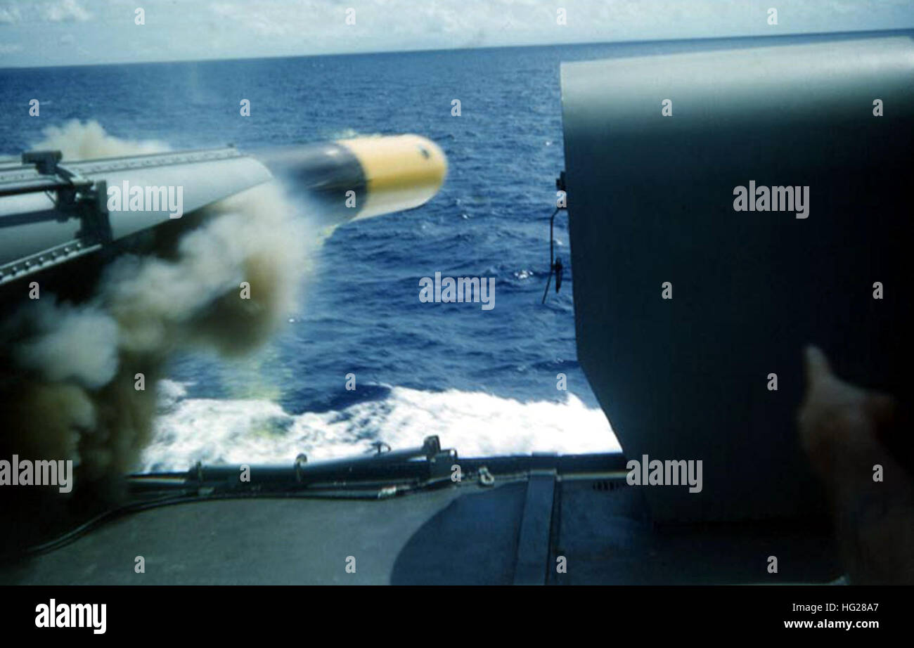 USS O'Brien (DD-725) firing a torpedo during an exercise, circa 1952 ...