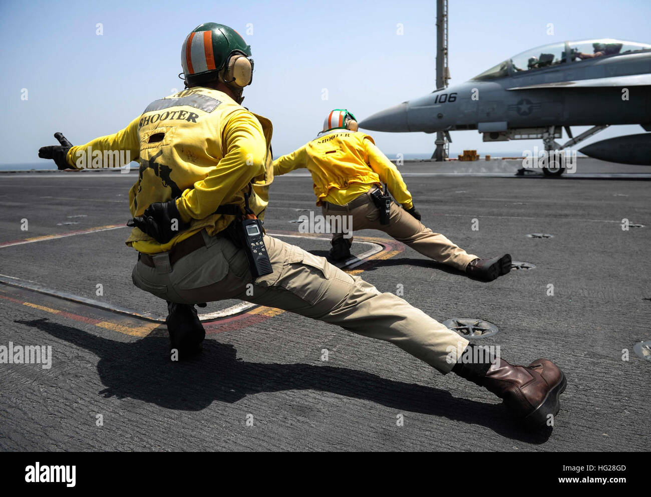 150702-N-GR120-188 ARABIAN GULF (July 2, 2015) - Shooters signal an F/A ...