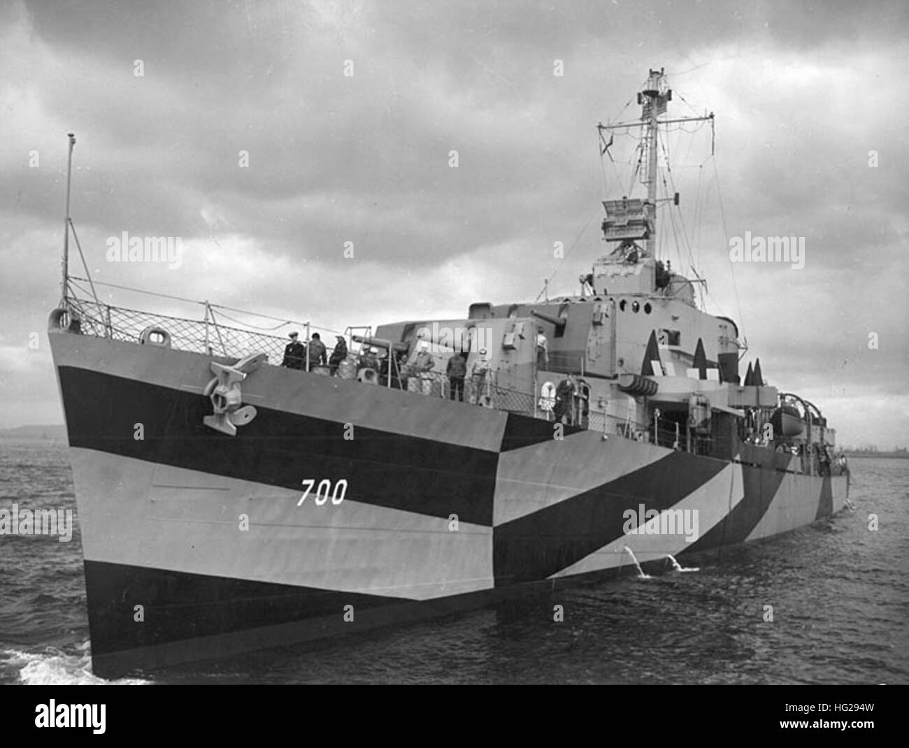 USS Haynsworth (DD-700) photographed circa July 1944. She is painted in ...