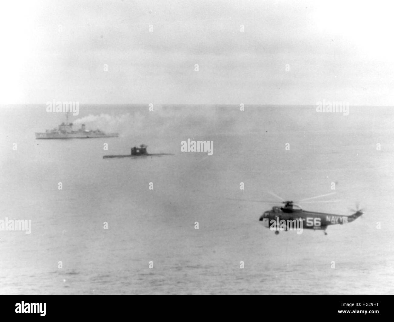 USS Carpenter (DD-825) and SH-3A of HS-2 with Soviet submarine in the ...