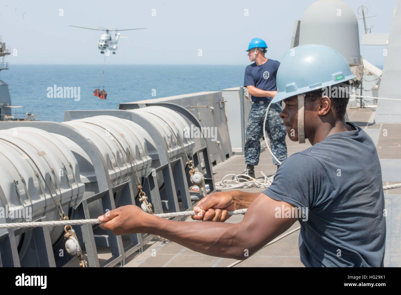 GULF OF ADEN (September 1, 2015) Seaman Michael Shorunkehsawyer heaves ...